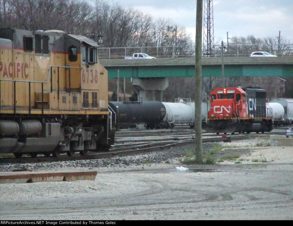 UP 6738 and GTW 6425